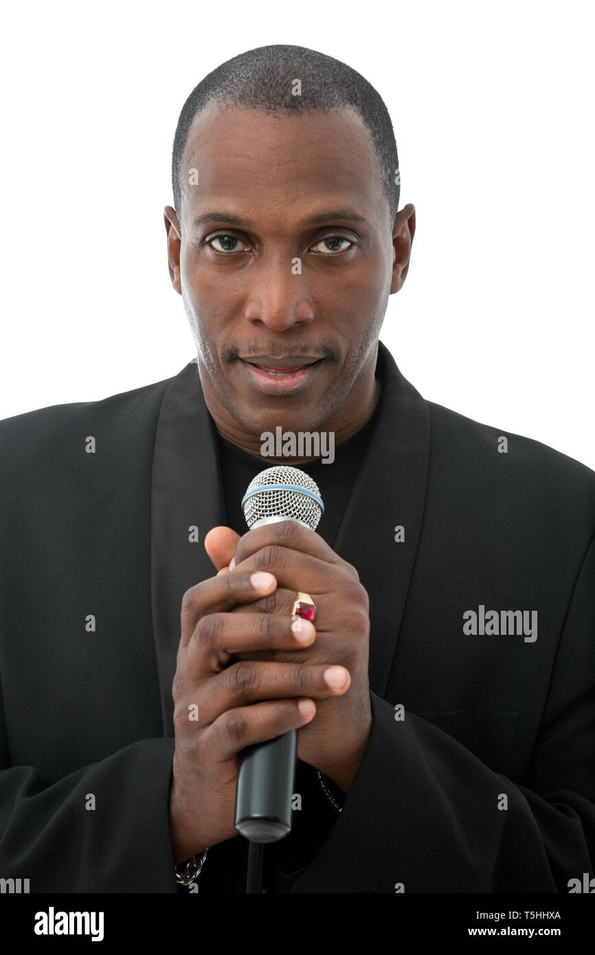 African American singer standing on a white background Stock Photo - Alamy