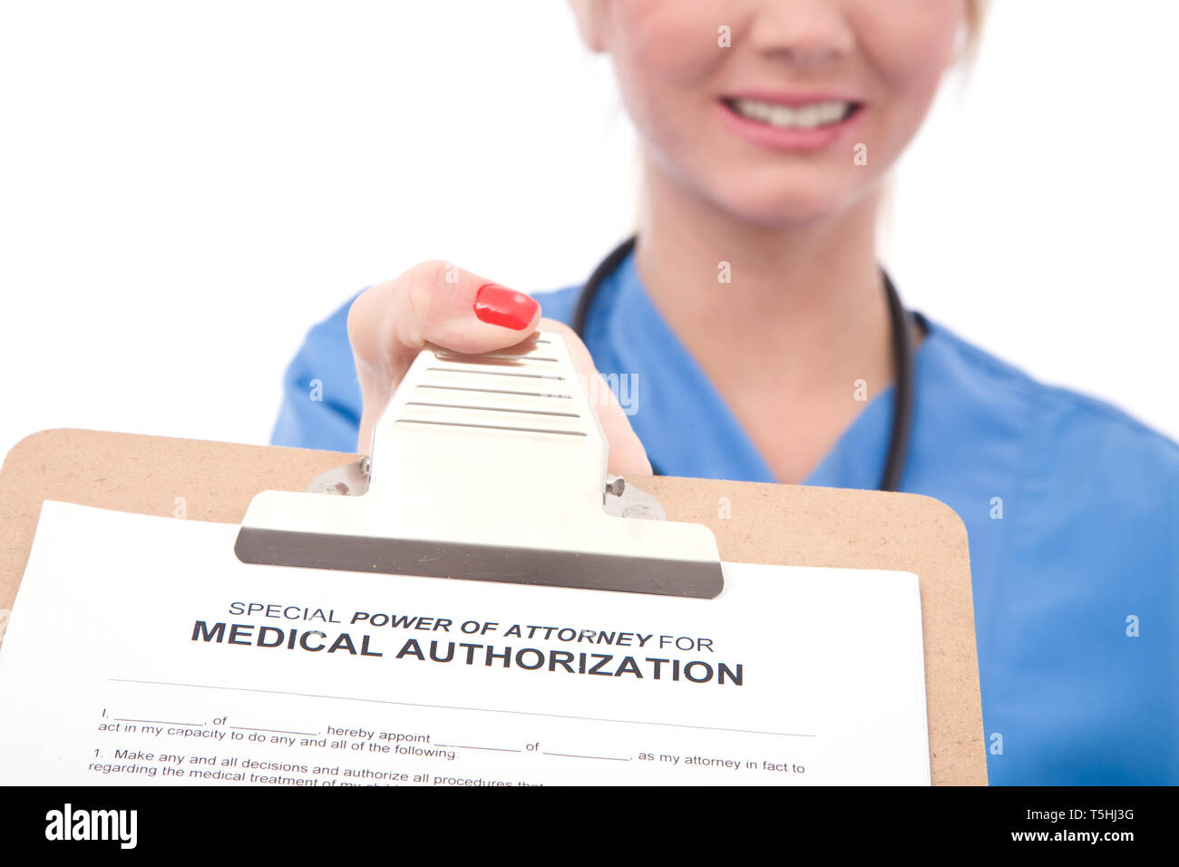 friendly female doctor with medical authorization form Stock Photo - Alamy