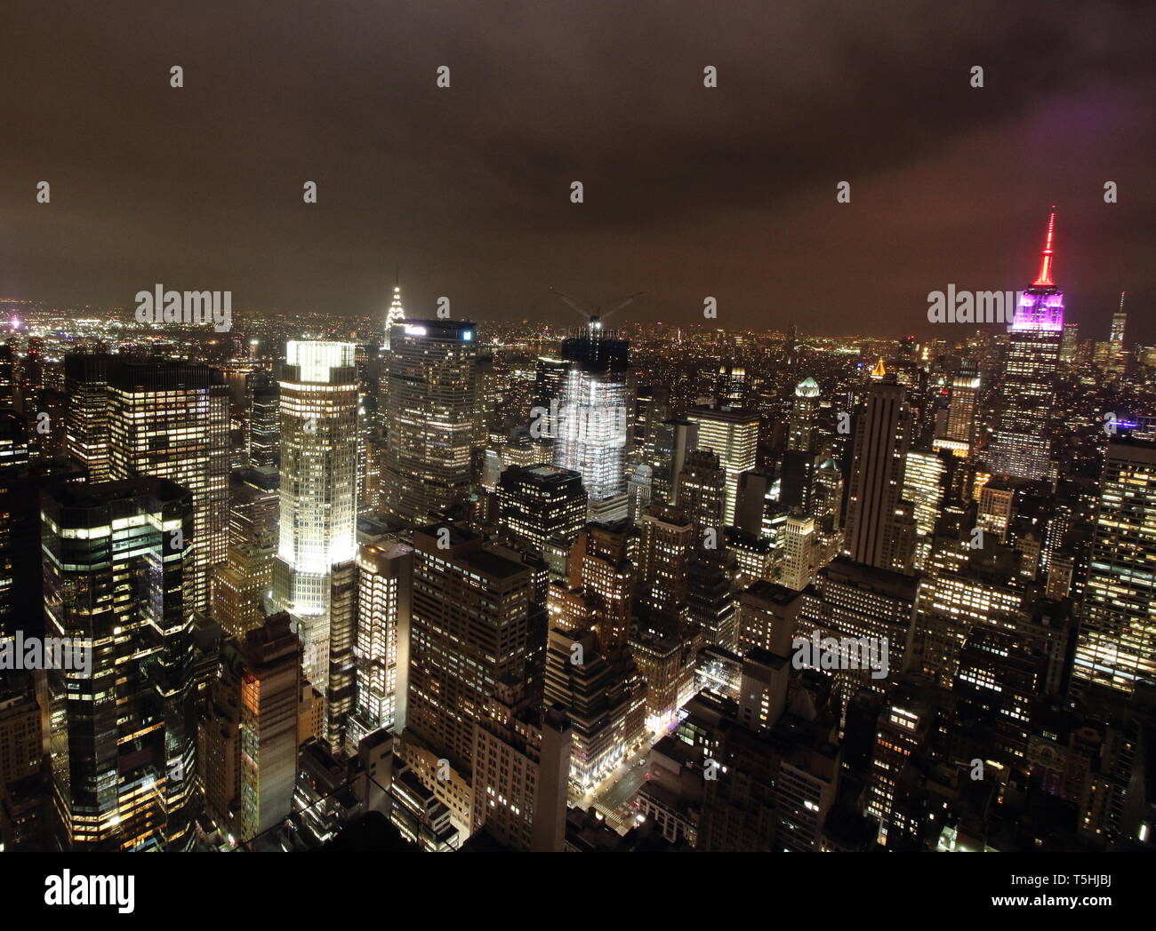 Manhattan at night from the Rockefeller Centre creating a classic city ...