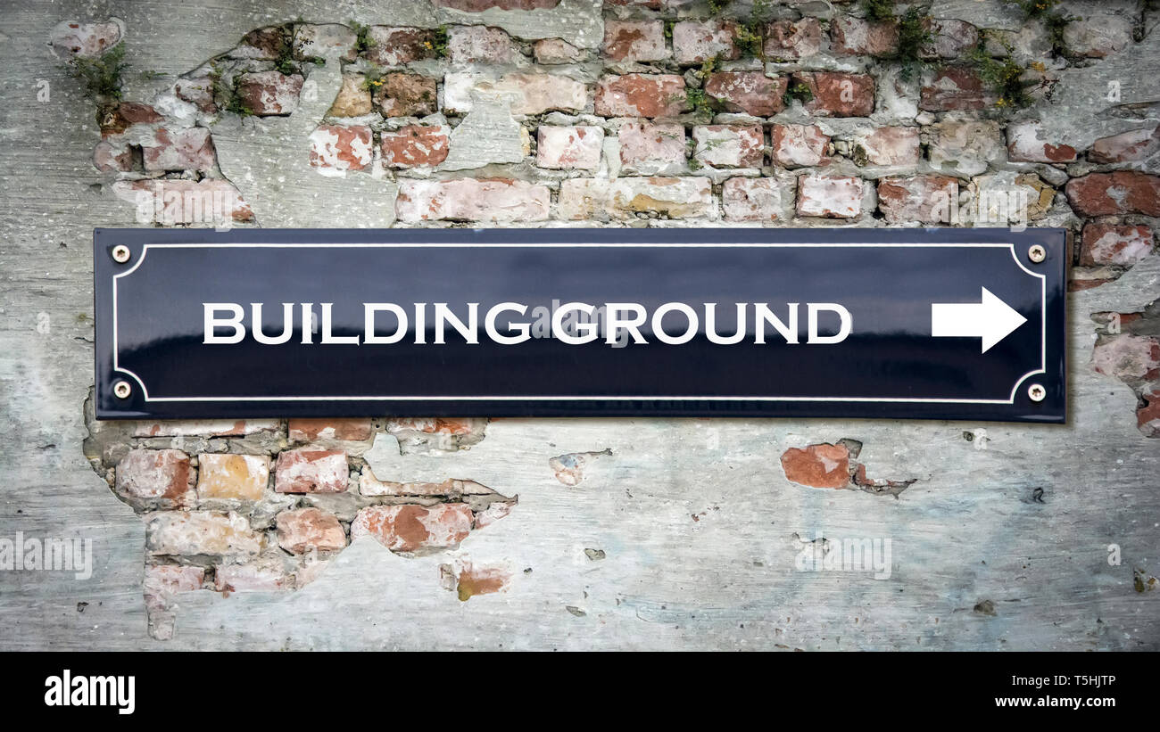 Street Sign BUILDING GROUND Stock Photo - Alamy