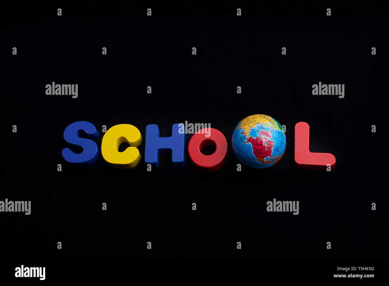 Education concept by School lettering with colorful wooden letters ...