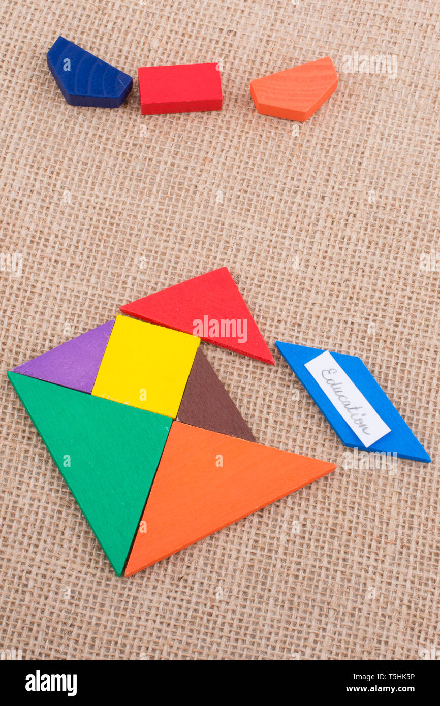 Colorful pieces of a square tangram puzzle Stock Photo - Alamy