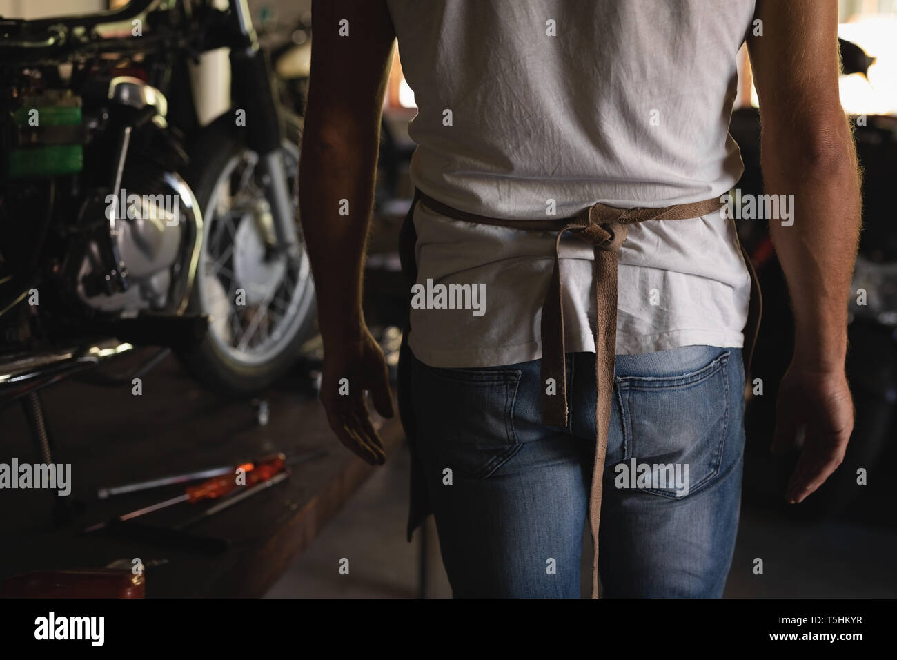 Mature mechanic man standing hi-res stock photography and images - Alamy