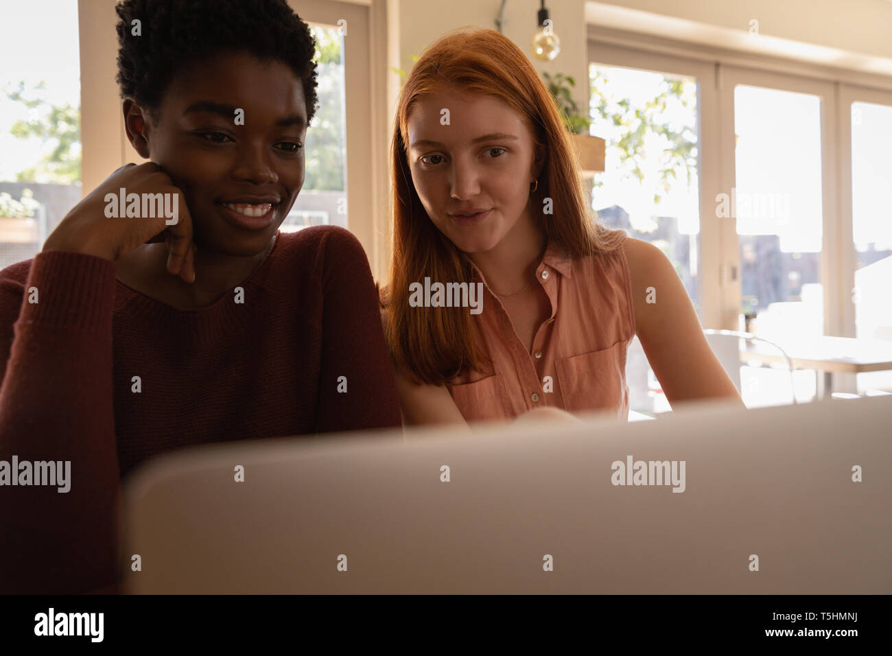 Young friends interacting other hi-res stock photography and images - Alamy