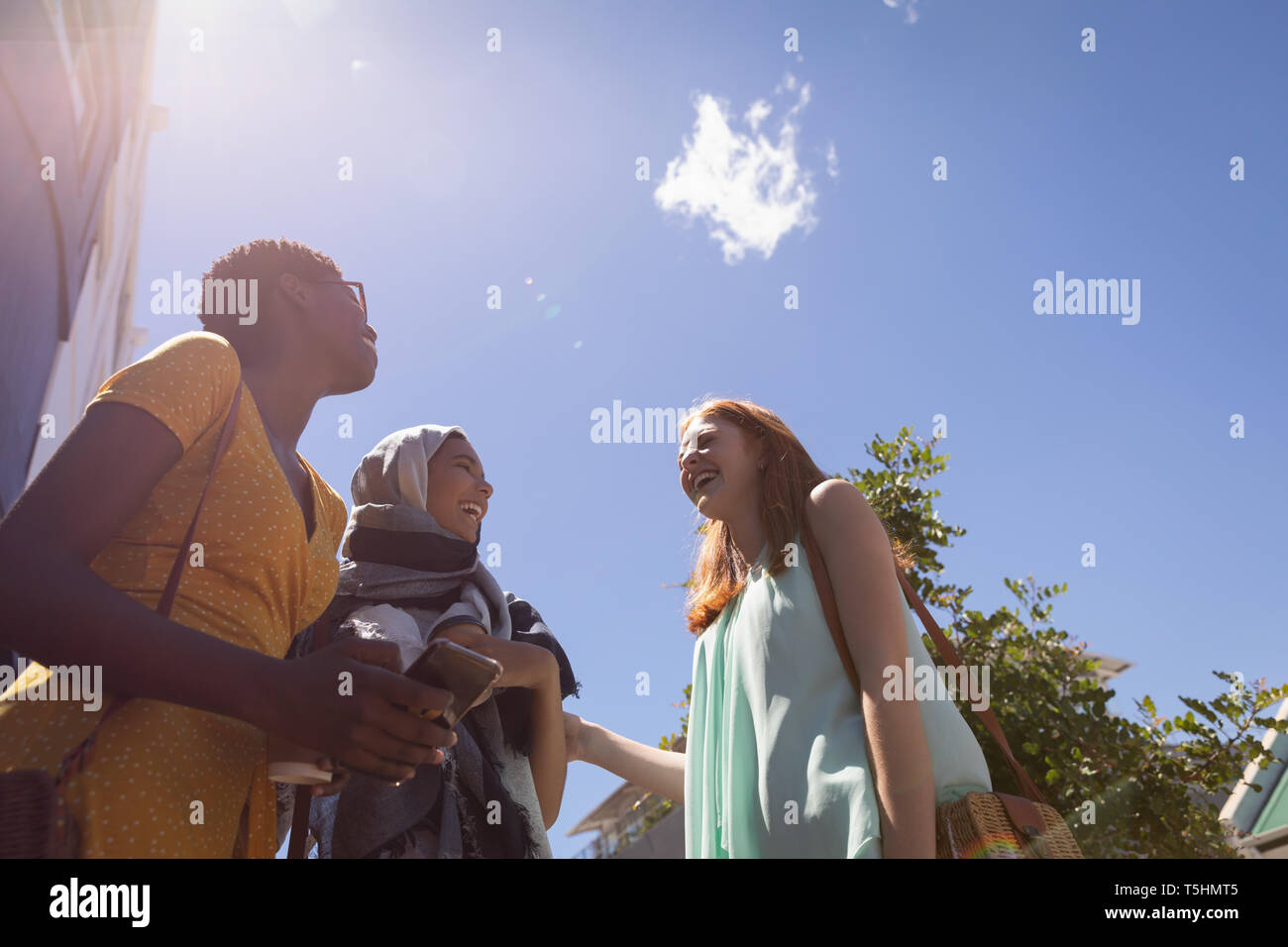 Female friends in the city hi-res stock photography and images - Alamy