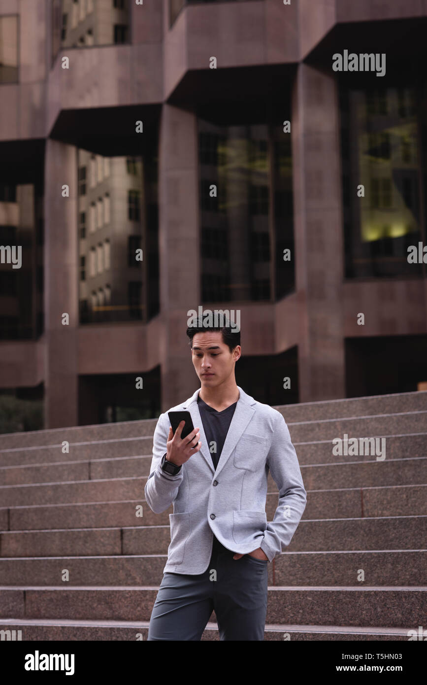 Man standing on stairs hi-res stock photography and images - Alamy