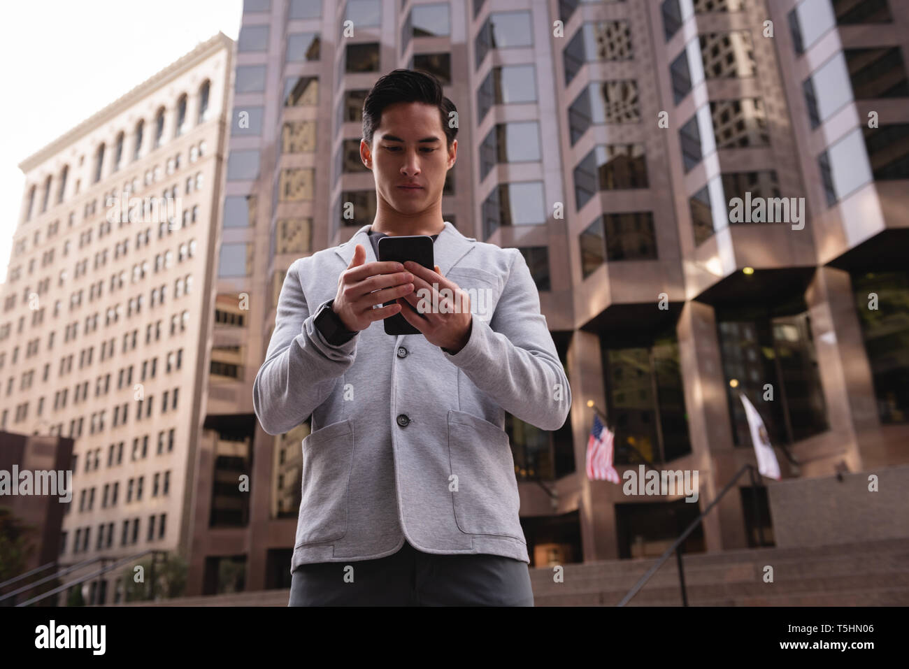 Man standing on stairs hi-res stock photography and images - Alamy