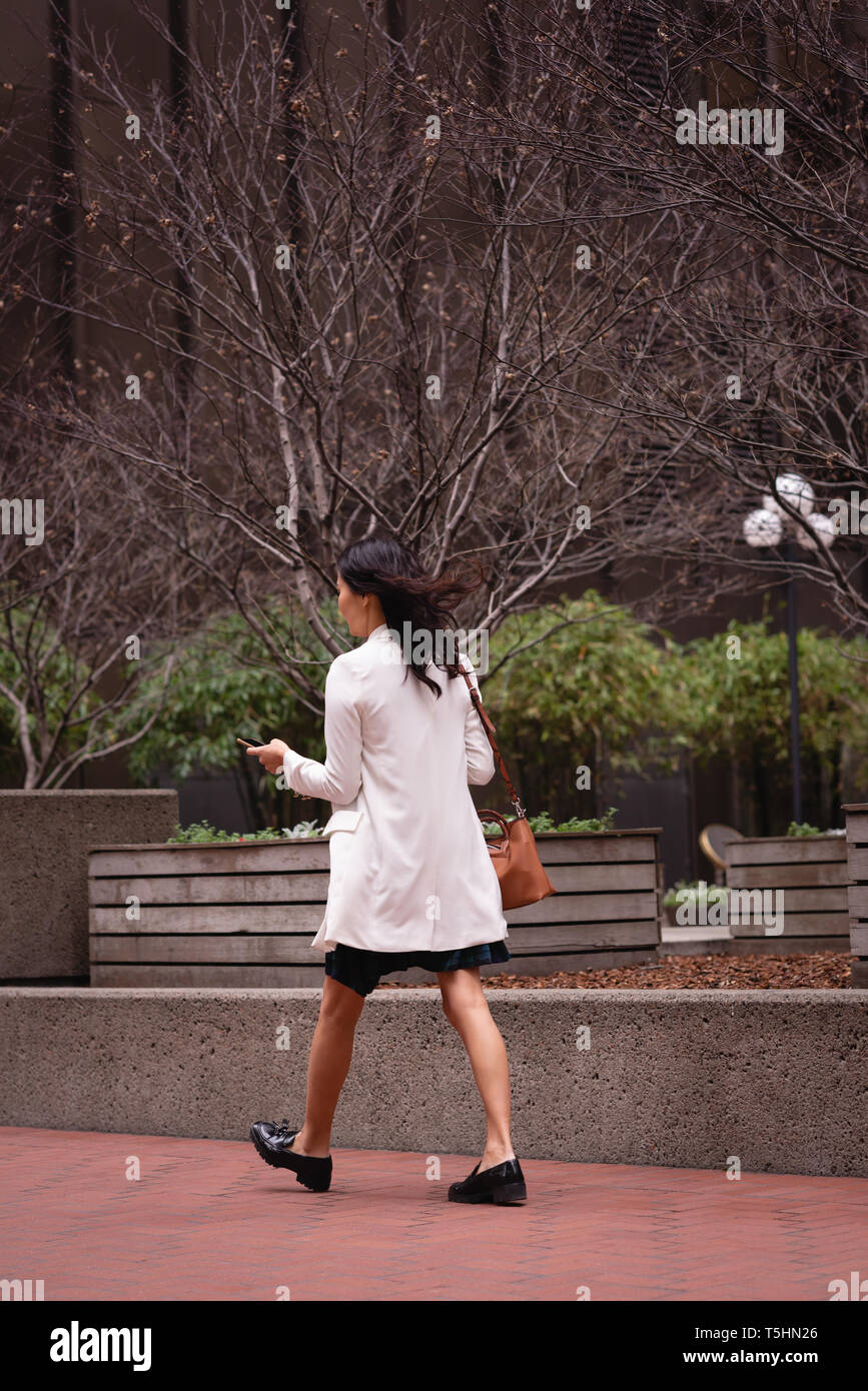 Woman walk side hi-res stock photography and images - Alamy