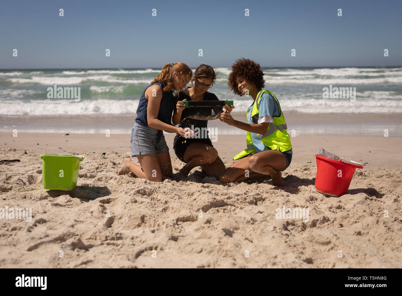 Cleaning beach person hi-res stock photography and images - Alamy