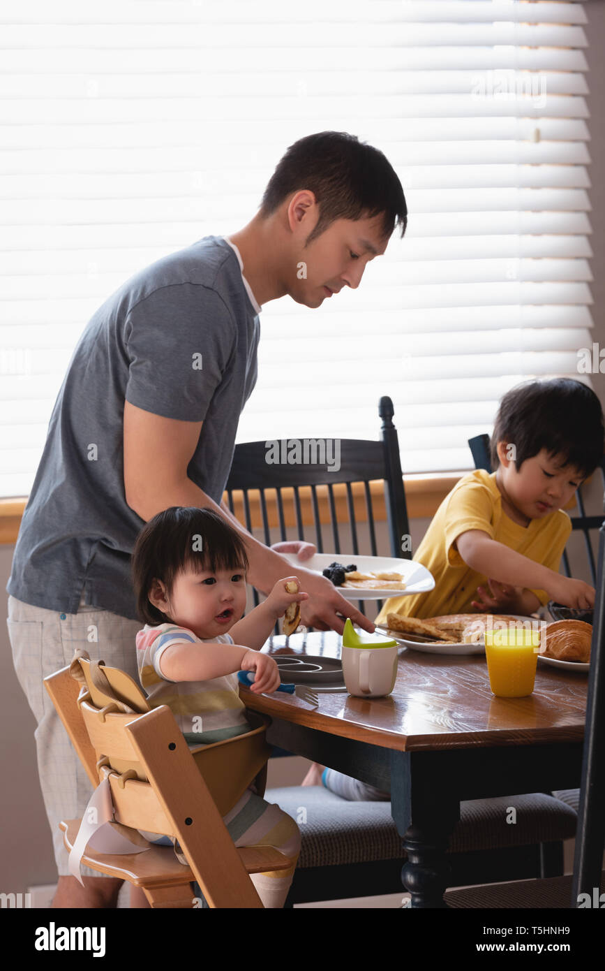 Men at breakfast table hi-res stock photography and images - Alamy
