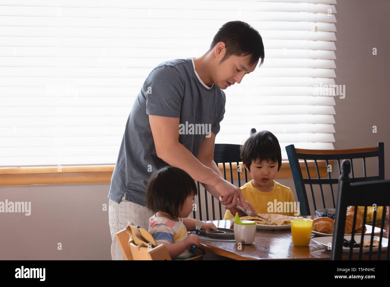 Men at breakfast table hi-res stock photography and images - Alamy