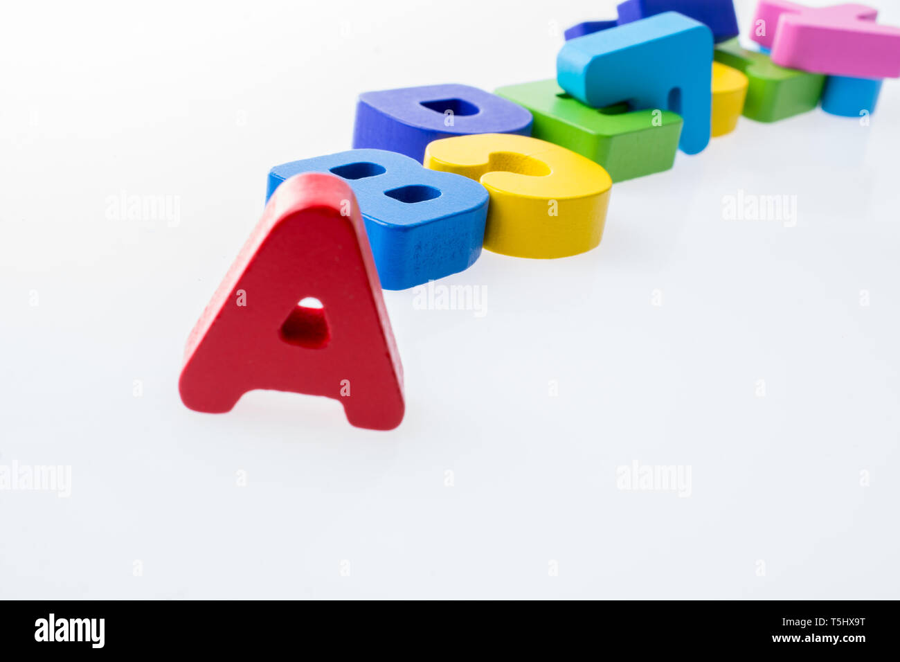 Letter cubes of Alphabet made of wood Stock Photo - Alamy