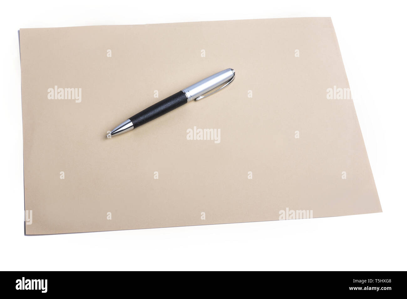 Pen and plain color paper on an isolated background Stock Photo - Alamy