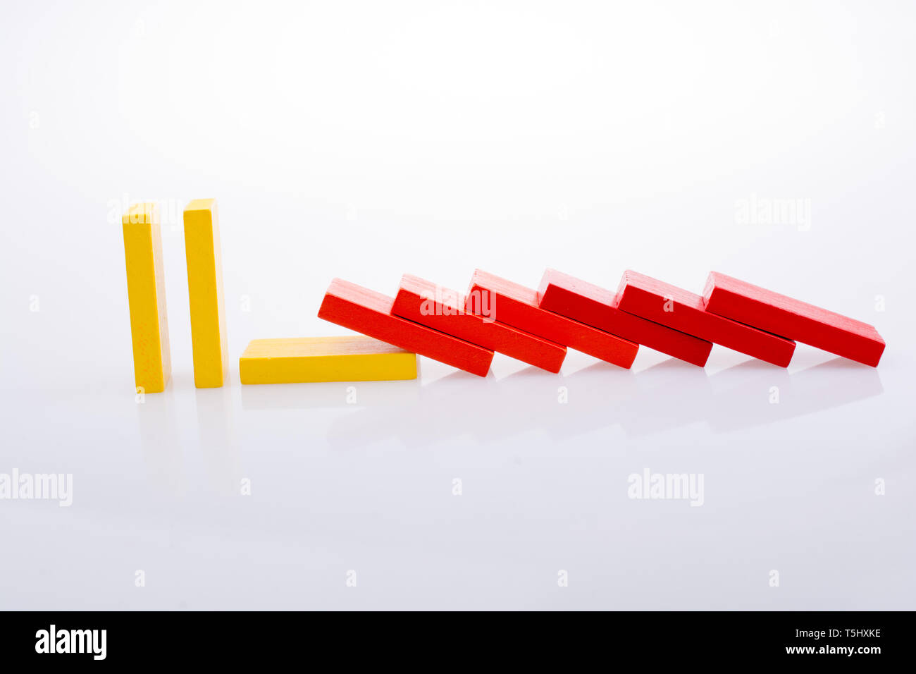 Colorful Domino Blocks in a line on a white background Stock Photo - Alamy