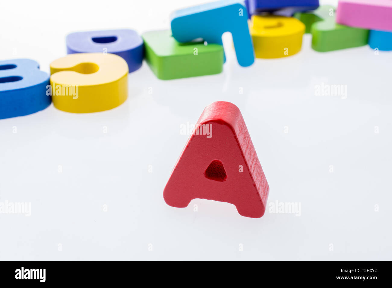 Letter cubes of Alphabet made of wood Stock Photo - Alamy