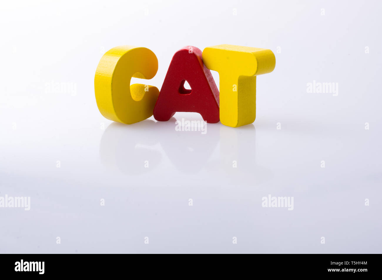 the word CAT written with colorful letter blocks Stock Photo - Alamy