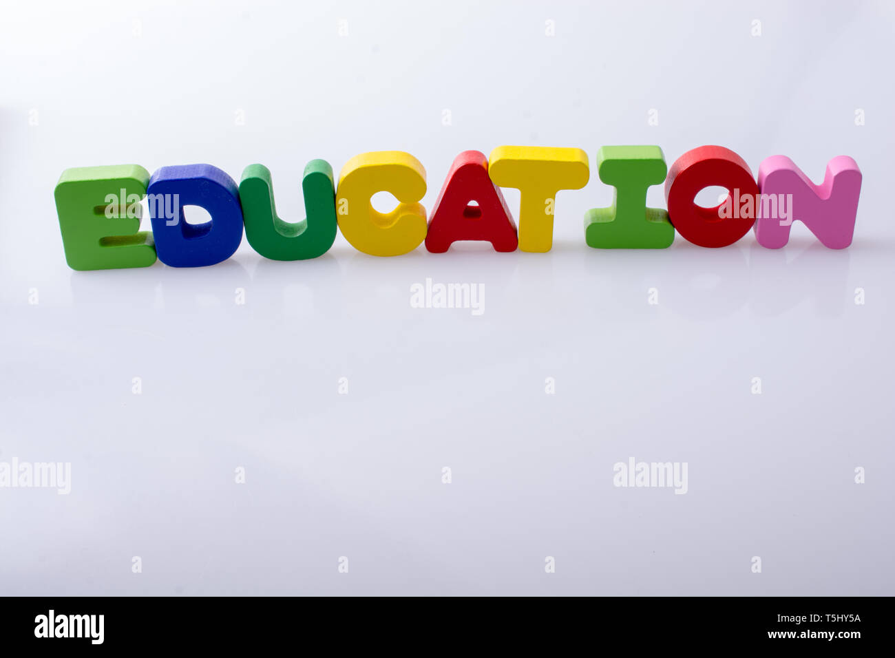 the word EDUCATION written with colorful letter blocks Stock Photo - Alamy