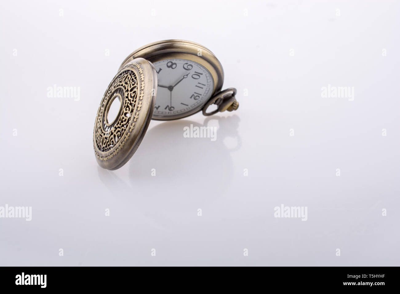 Mechanical retro styled pocket watch in view Stock Photo - Alamy