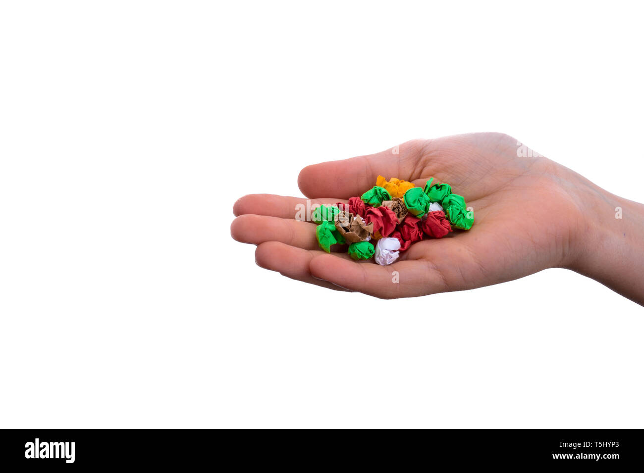 handful crumpled colorful paper on a white background Stock Photo - Alamy