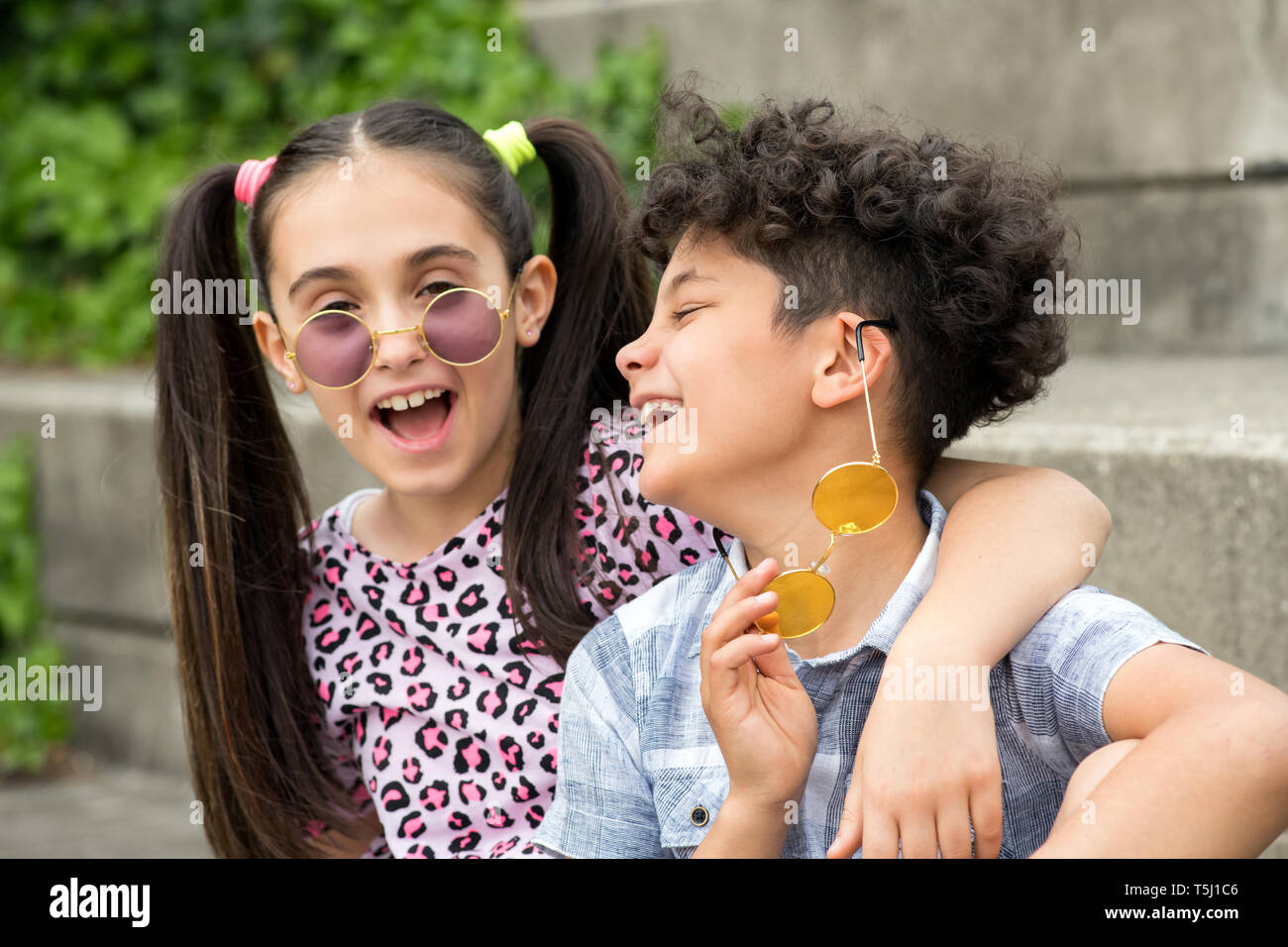 Children joking hi-res stock photography and images - Alamy