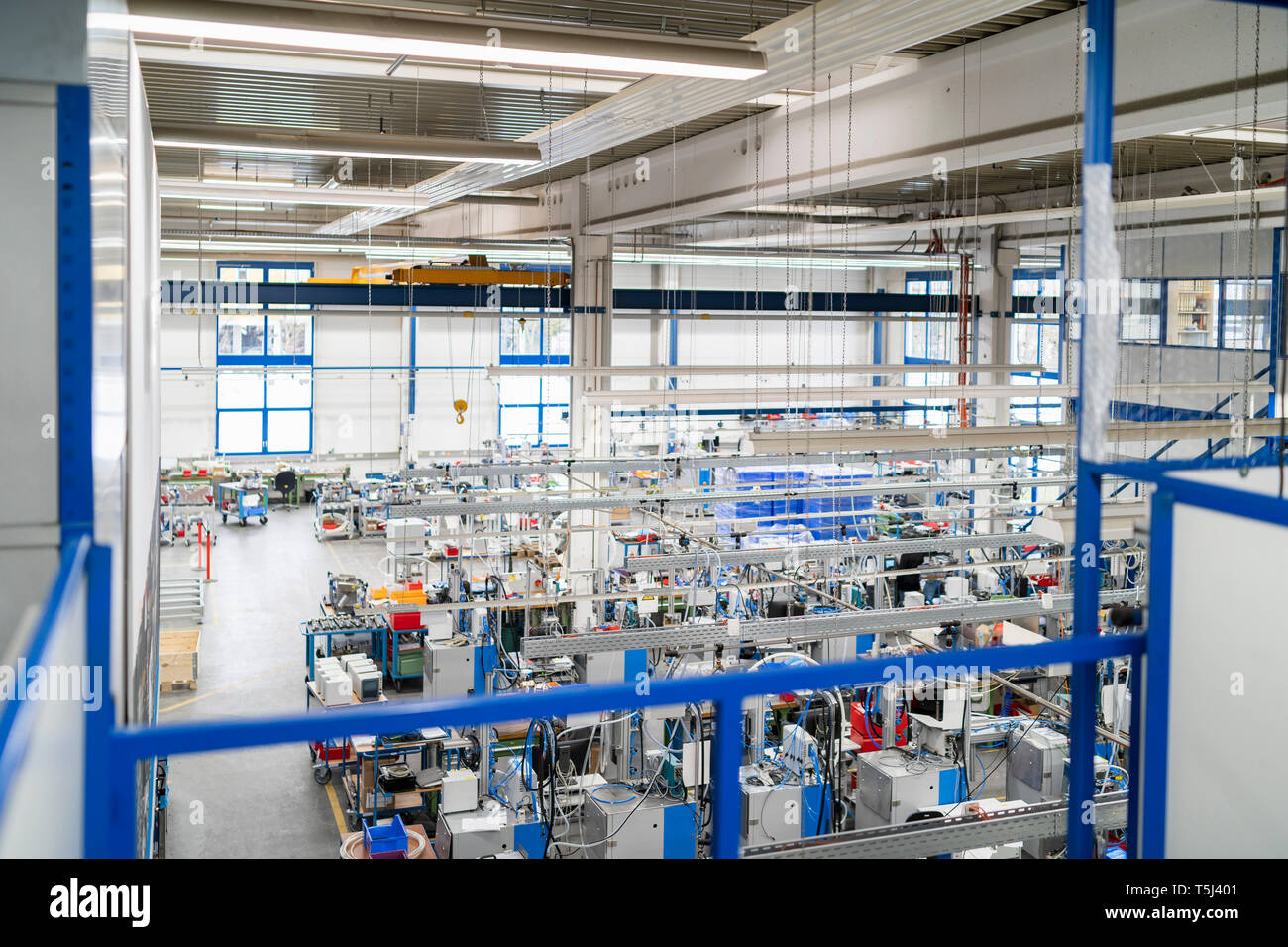 Machines on factory shop floor Stock Photo - Alamy