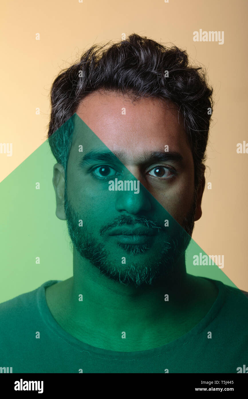 Portrait of an Indian man behind green glass layers Stock Photo - Alamy