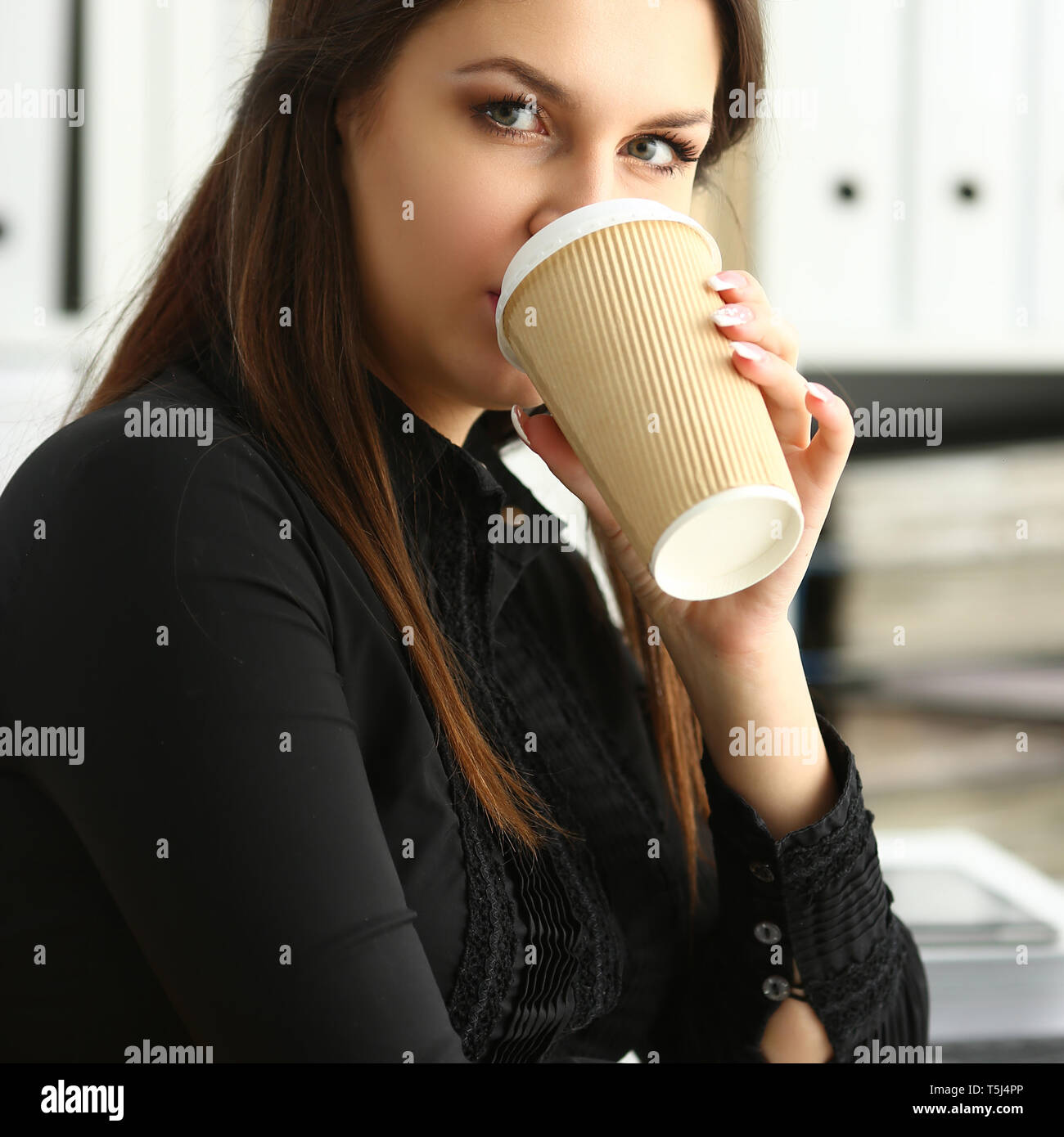 Smiling businesswoman holding bill hi-res stock photography and images ...
