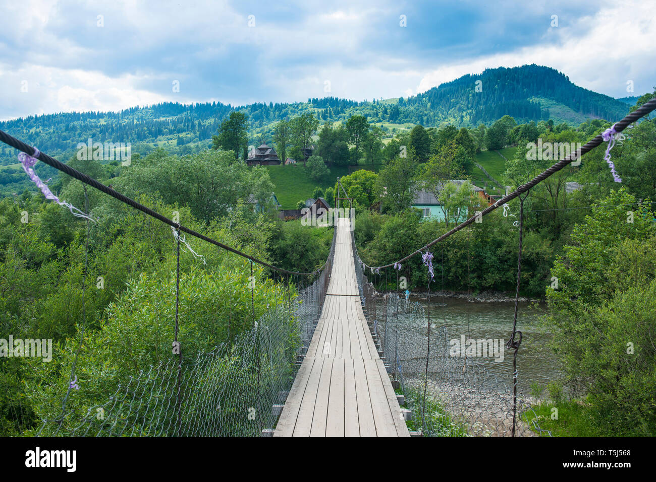 Ukraine, Carpathian mountains, Swinging bridge in Yasinia village Stock ...