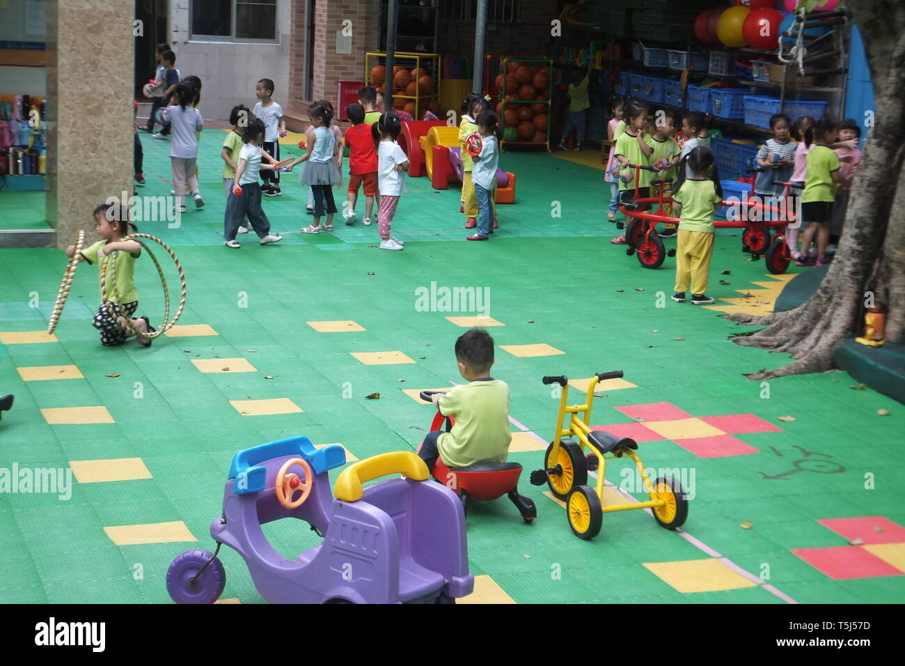 Shenzhen, China: children play during an activity class at a ...