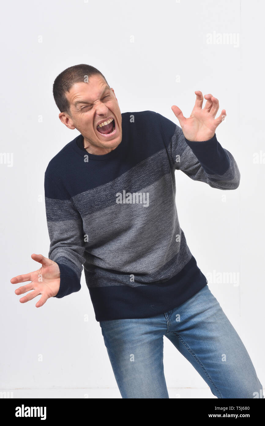 man screaming and raging on white background Stock Photo - Alamy