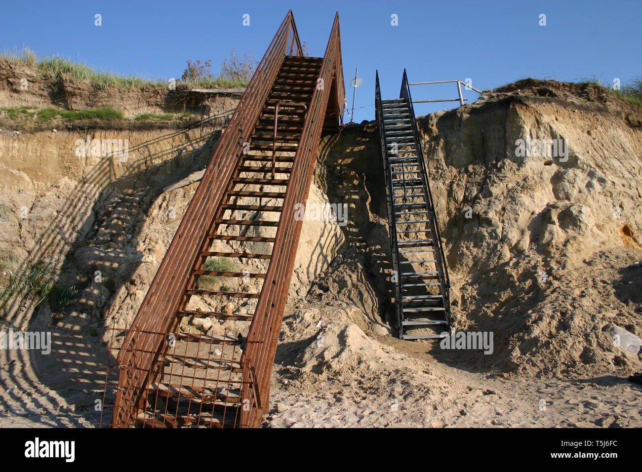 two rusty steel stairs upwards Stock Photo - Alamy