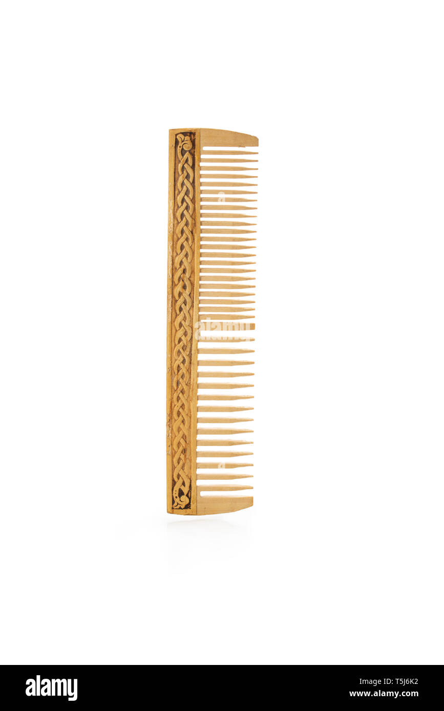 Wooden comb isolated on white background Stock Photo - Alamy