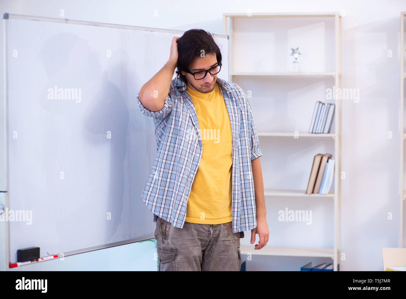 Two male students in the classroom Stock Photo - Alamy