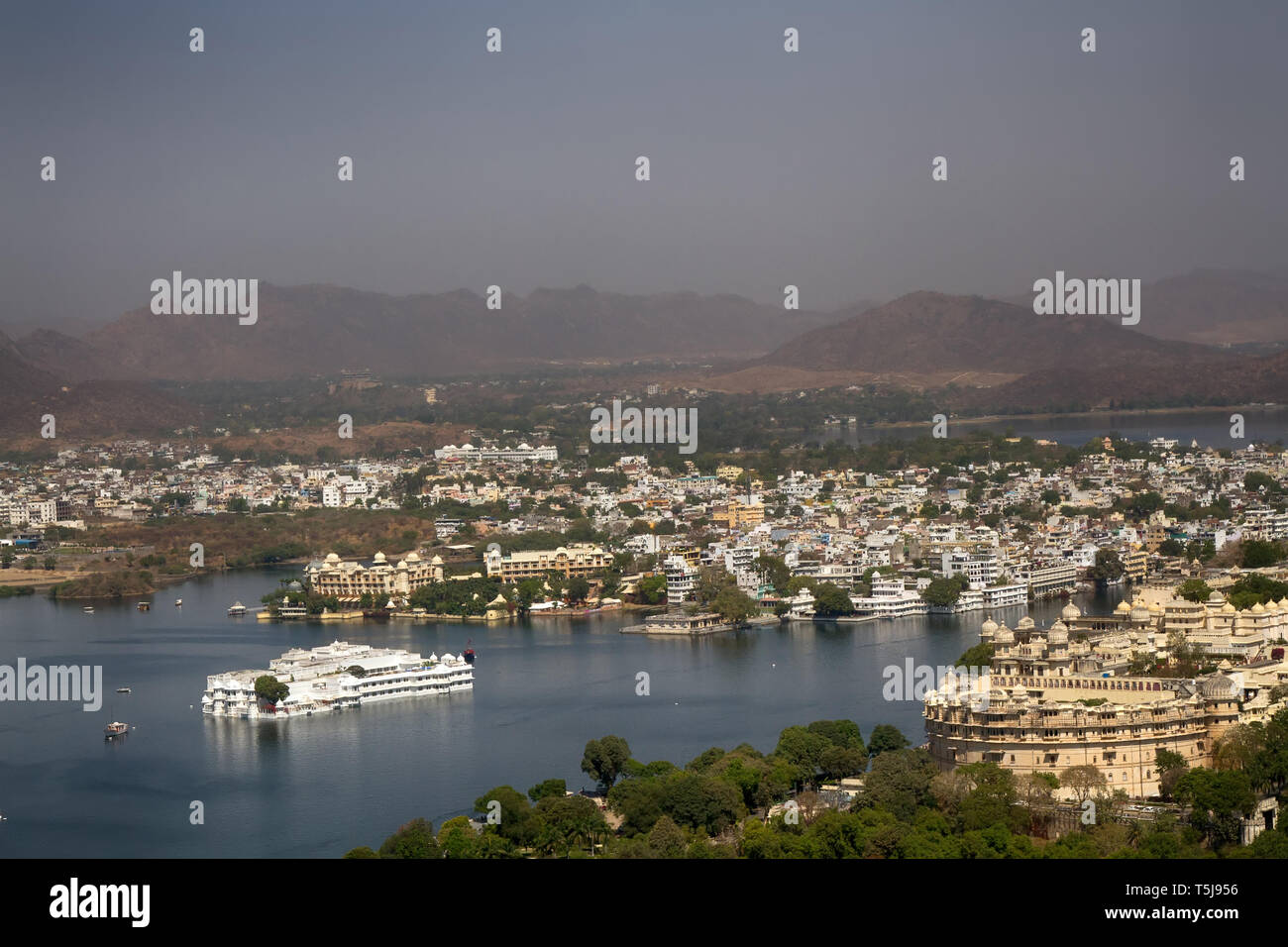 Great Indian cities. The snow-white city of Udaipur is surrounded by a ...