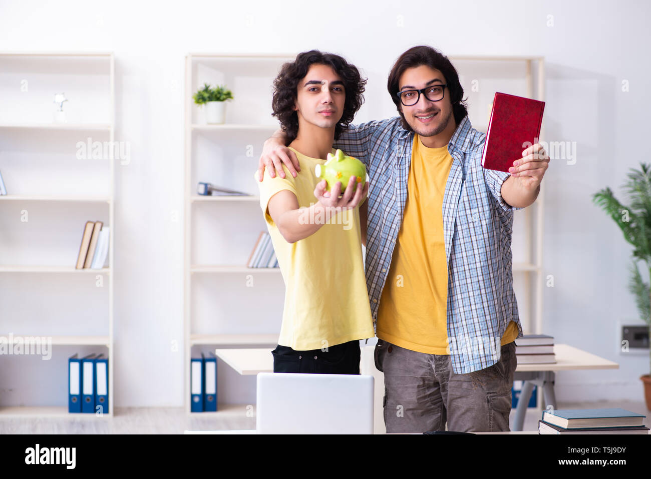Two male students in the classroom Stock Photo - Alamy