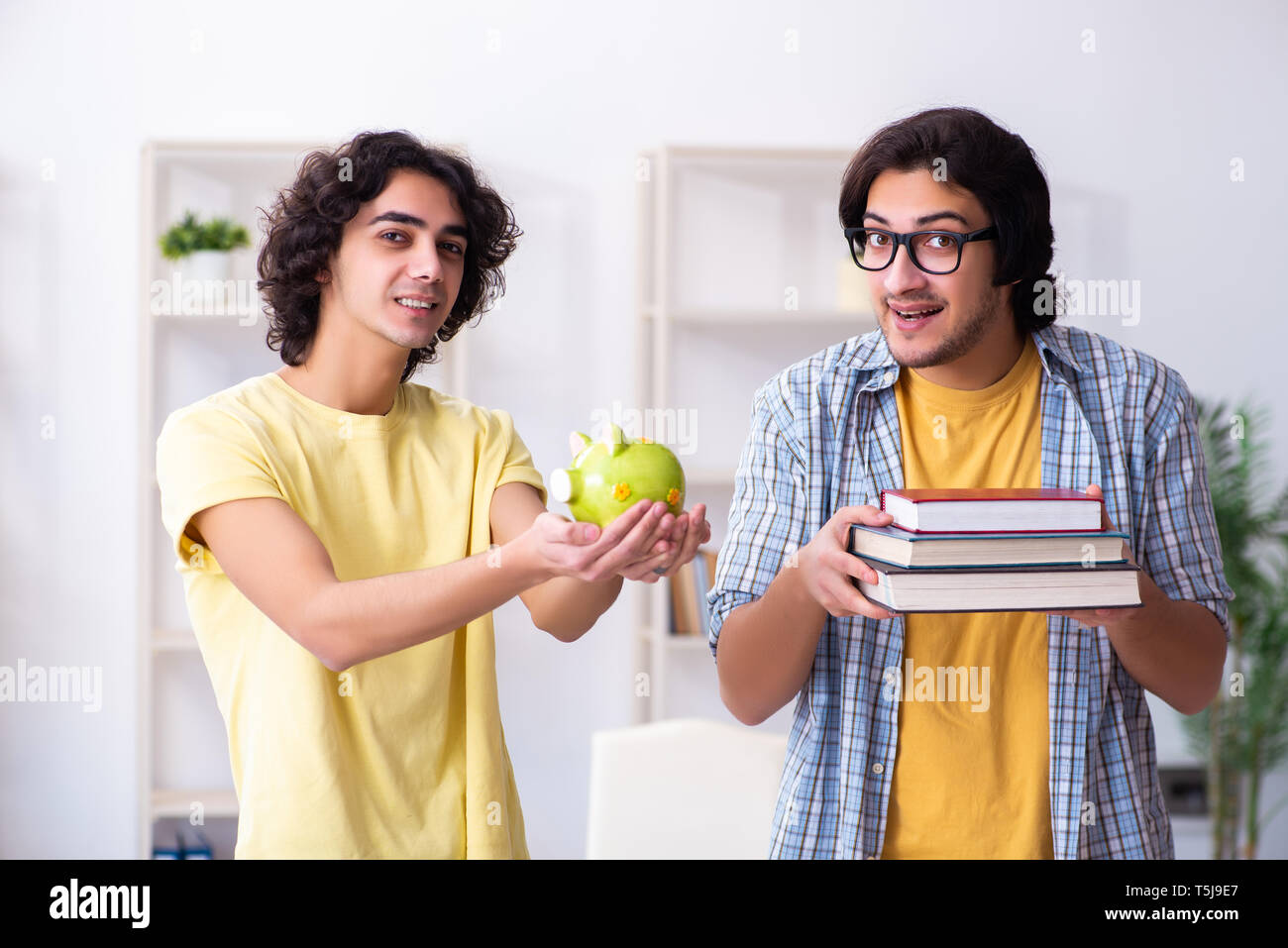 Two male students in the classroom Stock Photo - Alamy