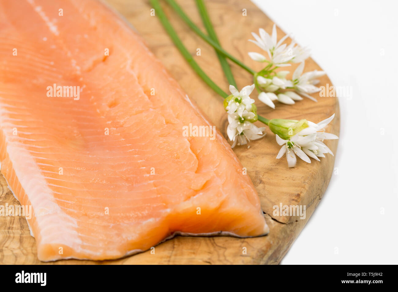 A single, raw fillet from a rainbow trout, Oncorhynchus mykiss, that ...