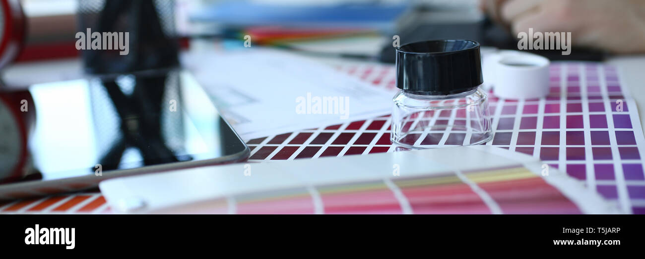 Test print paper page with colour test design fantail and magnifying ...