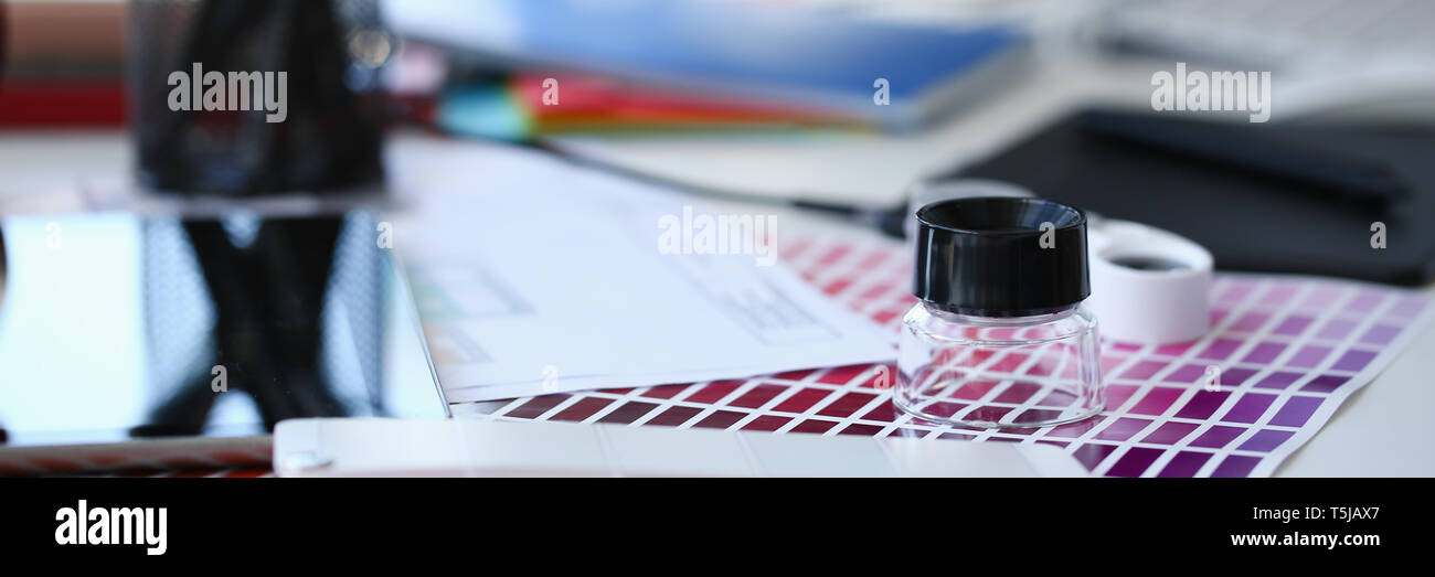 Test print paper page with colour test design fantail and magnifying ...