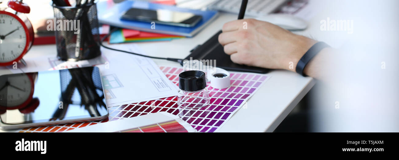 Test print paper page with colour test design fantail and magnifying ...