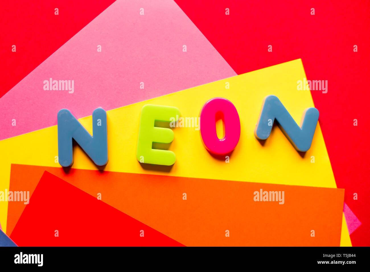 Neon word on multicolored background in trendy colors. Bright concept ...