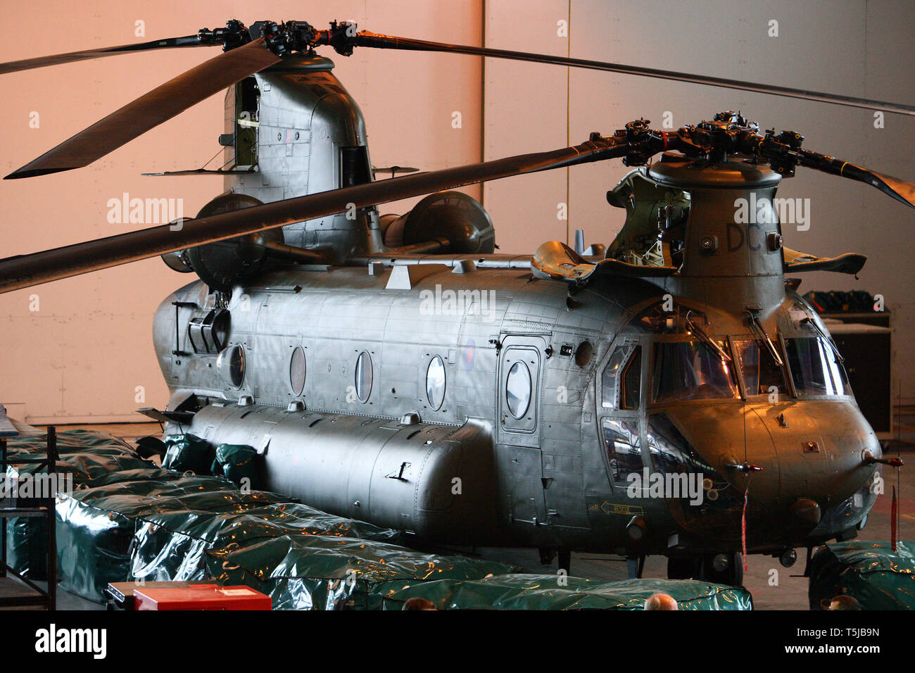 A Chinook helicopter sitting in a hanger at RAF Odiham in Hampshire. 13 ...