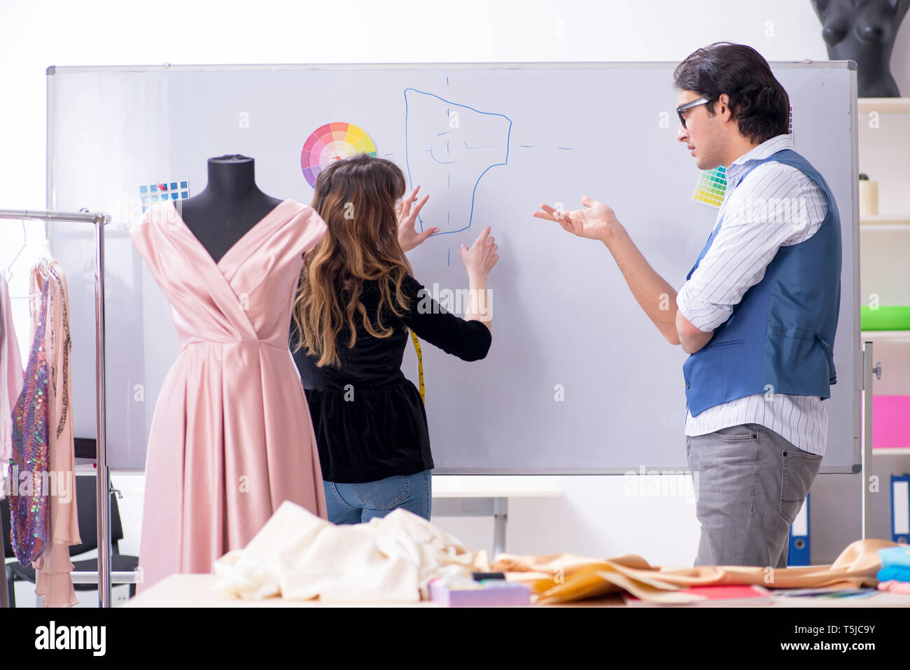 Tailor student choosing design hi-res stock photography and images - Alamy