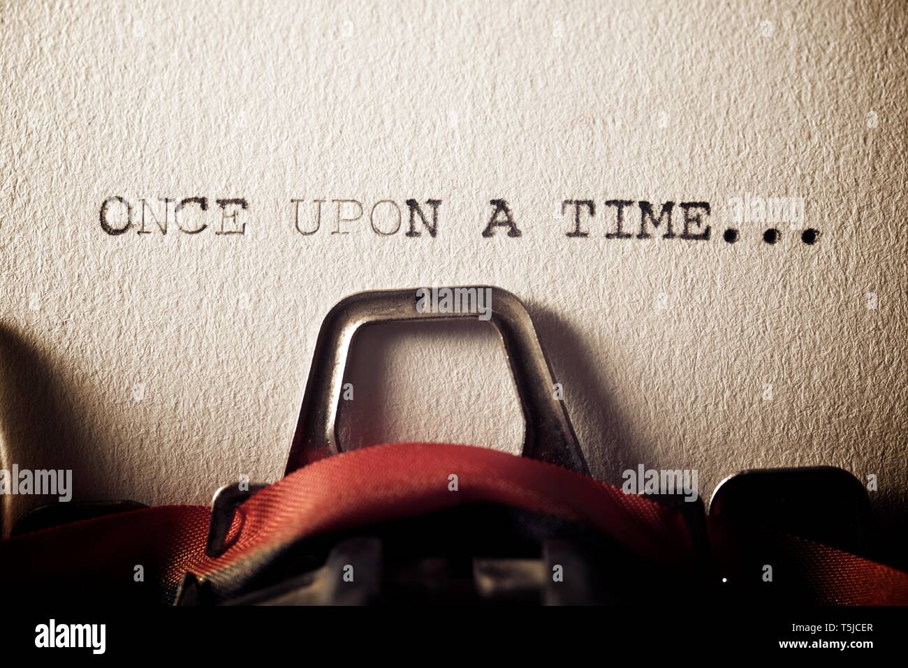 The sentence, once upon a time, written with a typewriter Stock Photo ...