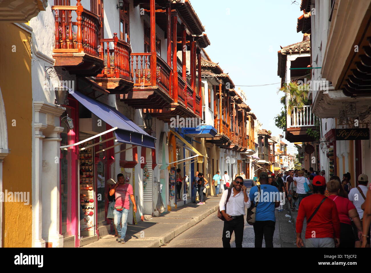 Colourful painted shops with wooden balconies in the Historic centre of ...