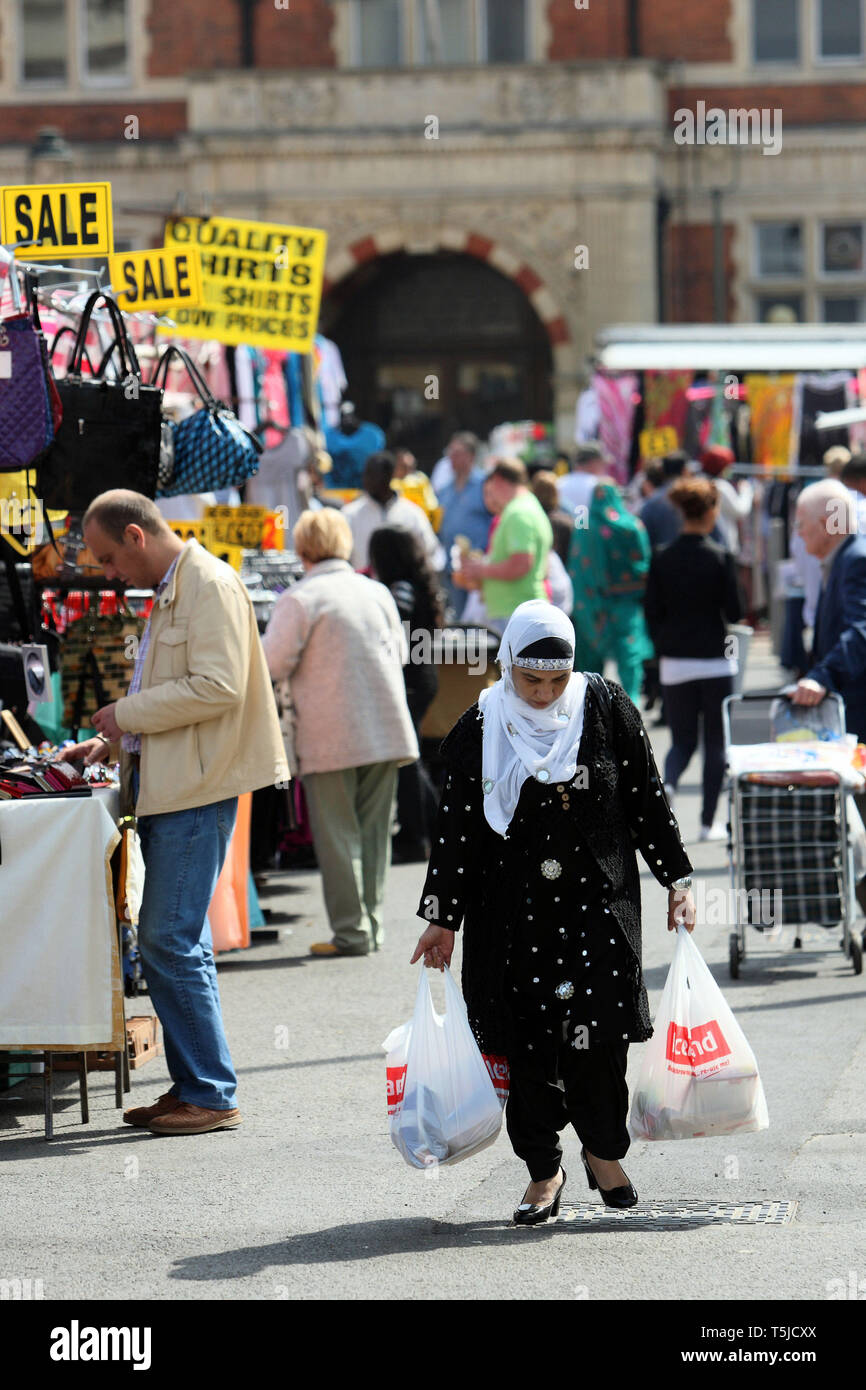 Shoppers going through the stalls at Barking Town Centre Market. East ...