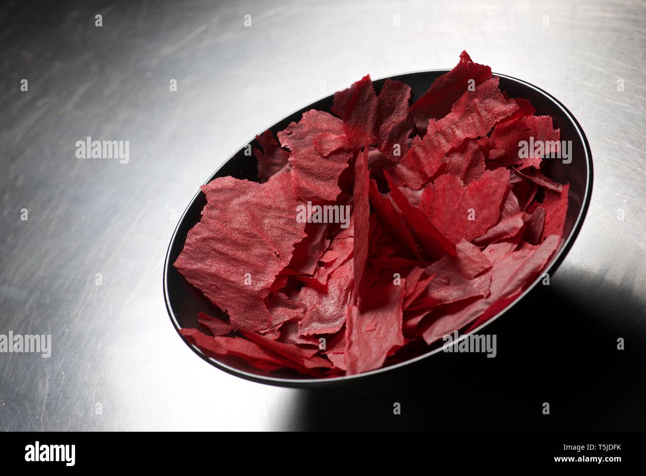 Colored chips in a bowl Stock Photo - Alamy