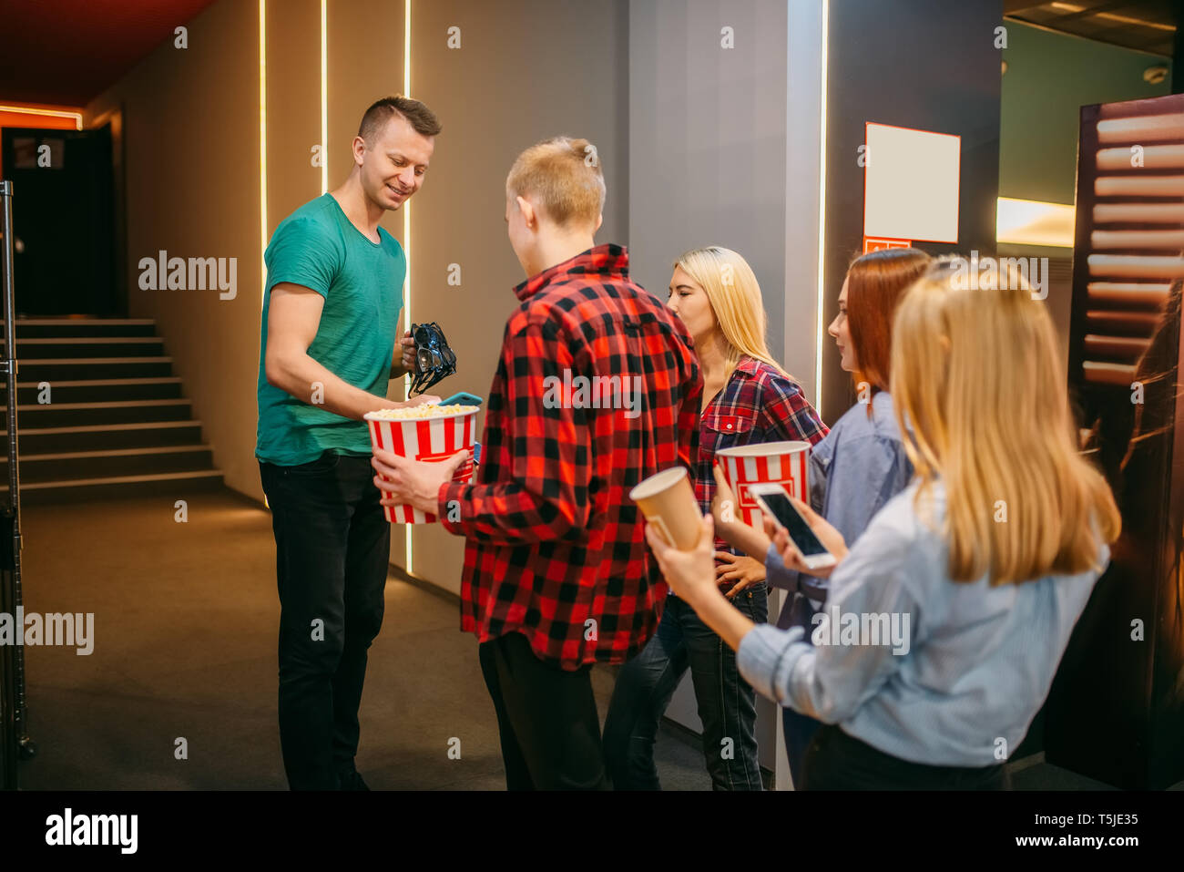 Audience scans tickets on the mobile phones before the showtime in ...