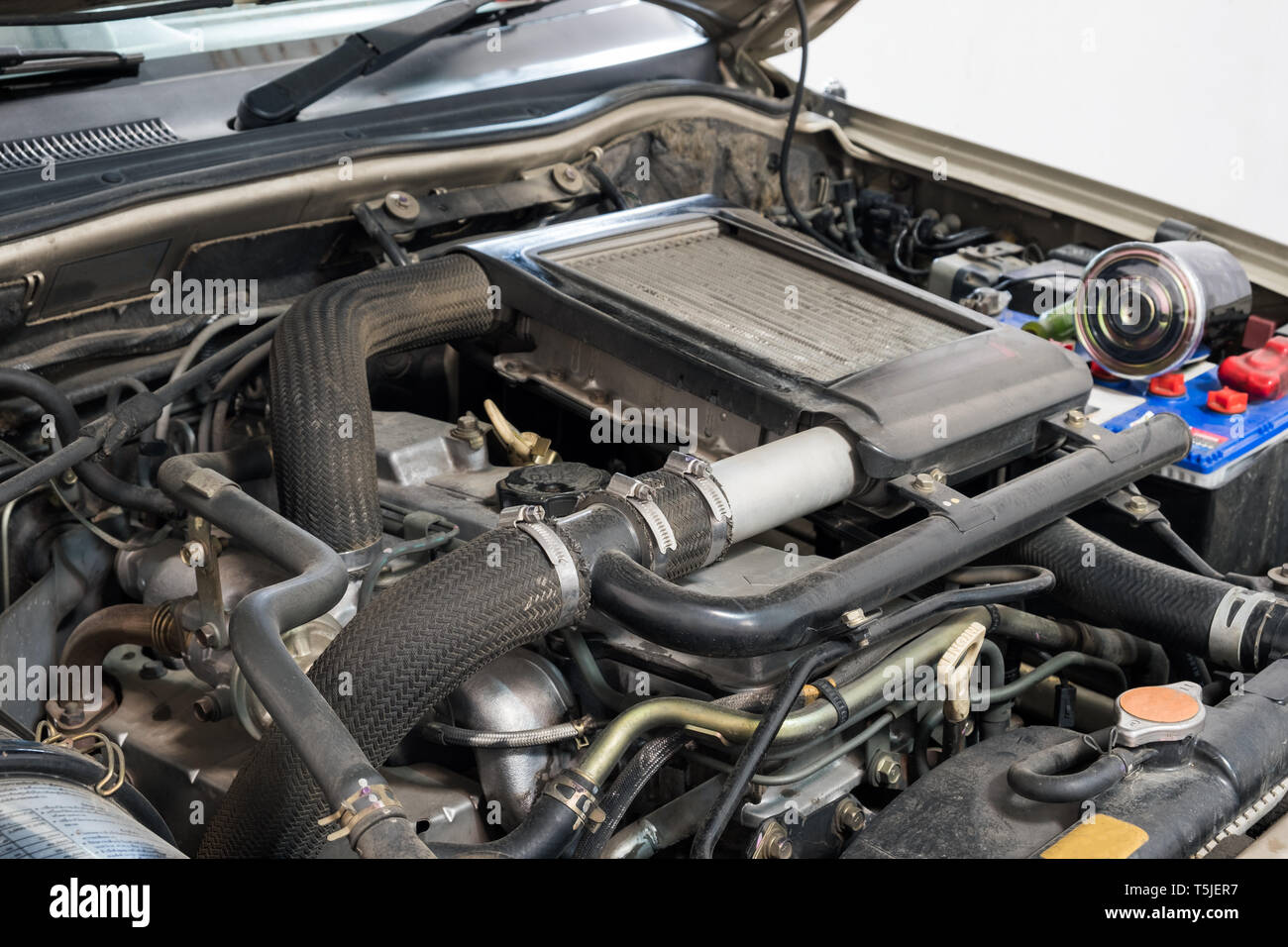 Checking fix and maintenance dirty diesel engine room Stock Photo - Alamy