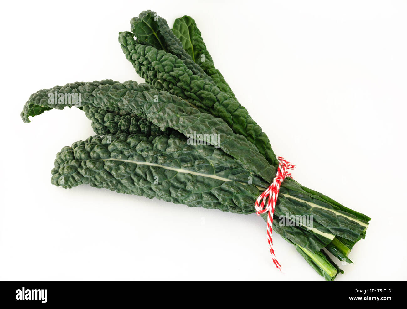 Bunch of kale on white background. Top view Stock Photo - Alamy